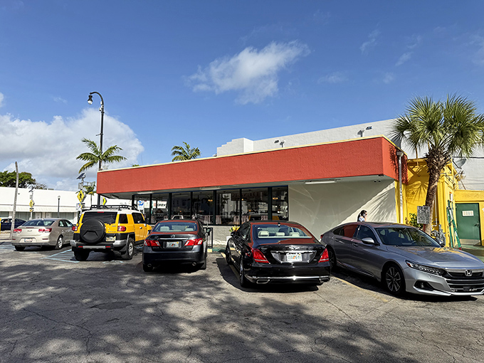 A parking lot filled with everything from work trucks to luxury sedans—good food is the ultimate social equalizer.