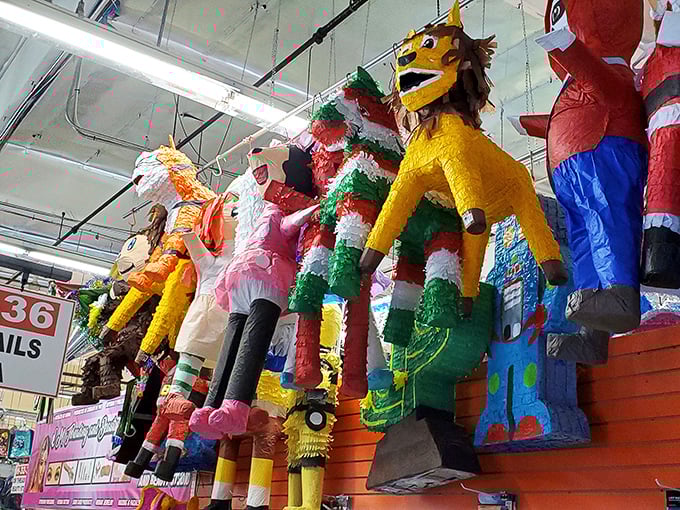 Piñatas hang like colorful sentinels, each one promising a party where smashing things with a stick is not only allowed but encouraged.