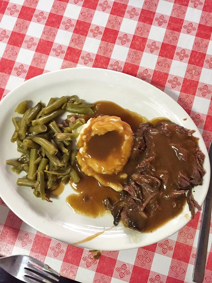 This isn't just pot roast—it's time travel on a plate, taking you straight back to Sunday dinners at grandma's house where seconds weren't just offered, but expected.