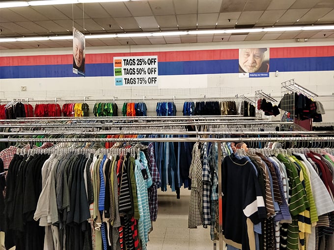 The color-coded shirt section – a rainbow of possibilities where savvy shoppers can refresh their wardrobe for less than the price of lunch.