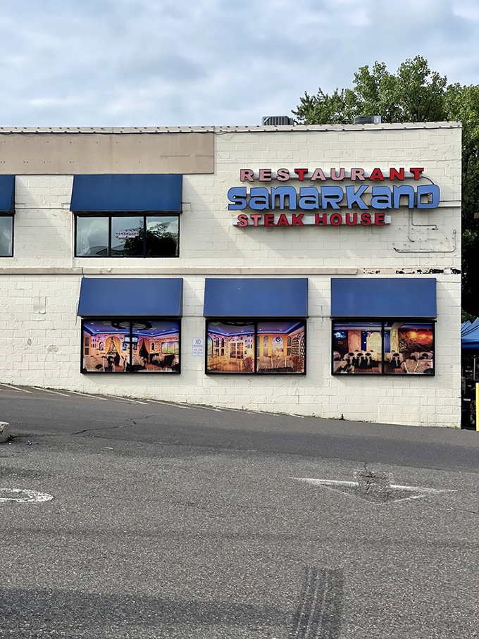 By day, the Samarkand sign is less flashy but no less inviting. Those blue awnings hint at the cool oasis of flavors waiting inside.