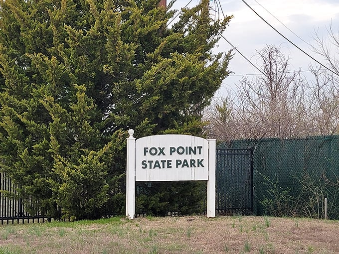 The understated entrance sign—like a humble maître d' who knows the experience beyond the door speaks for itself.