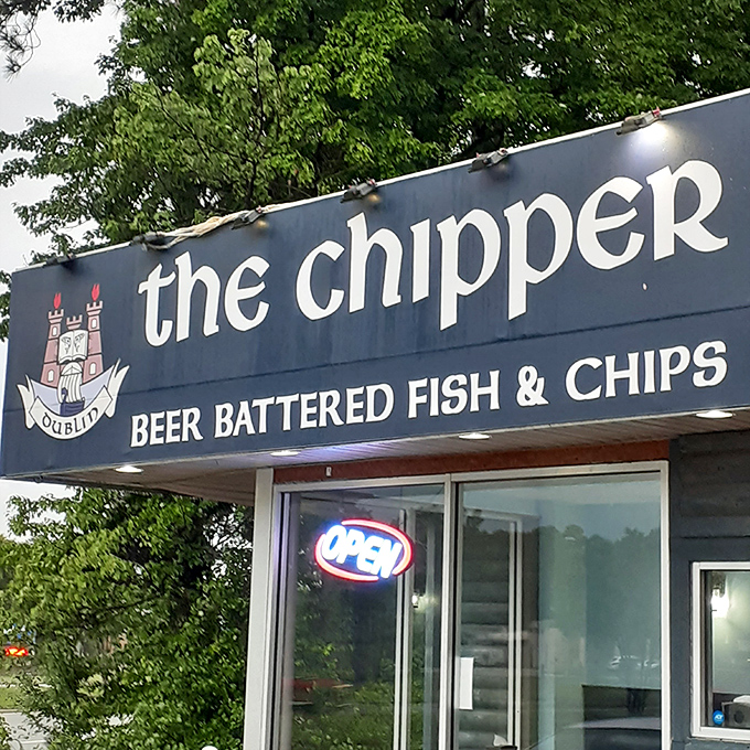 The Chipper's sign promises exactly what it delivers – proper beer-battered fish and chips that transport you across the Atlantic with every bite.