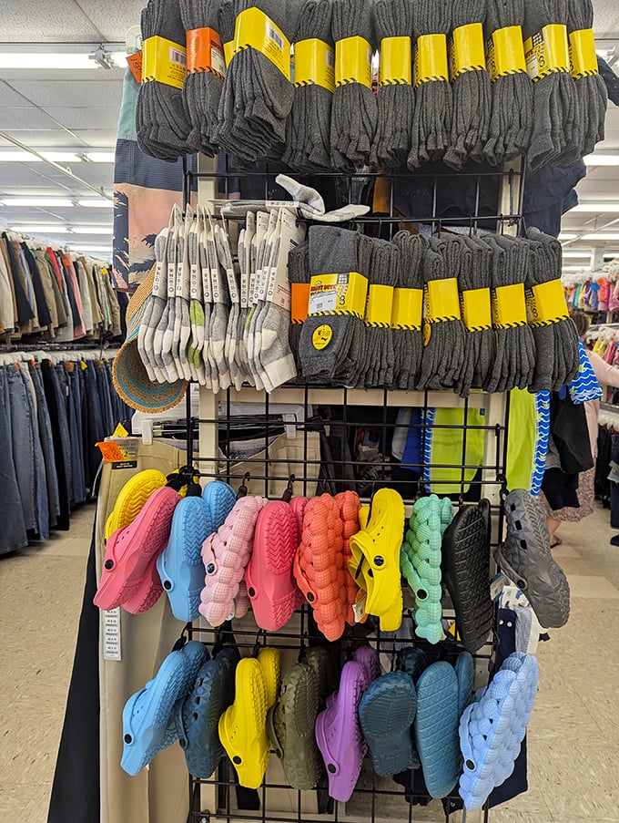 A colorful armada of foam clogs stands ready alongside practical sock options. Comfort doesn't have to be expensive, just occasionally questionable in style.