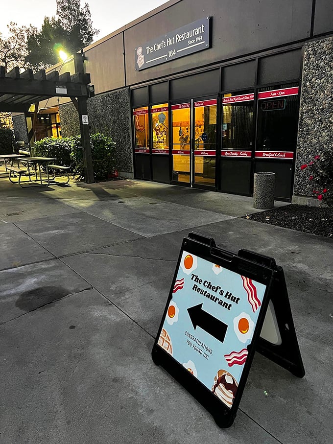 As evening falls, The Chef's Hut glows like a breakfast beacon. That sign might as well say, "Congratulations, your stomach thanks you."