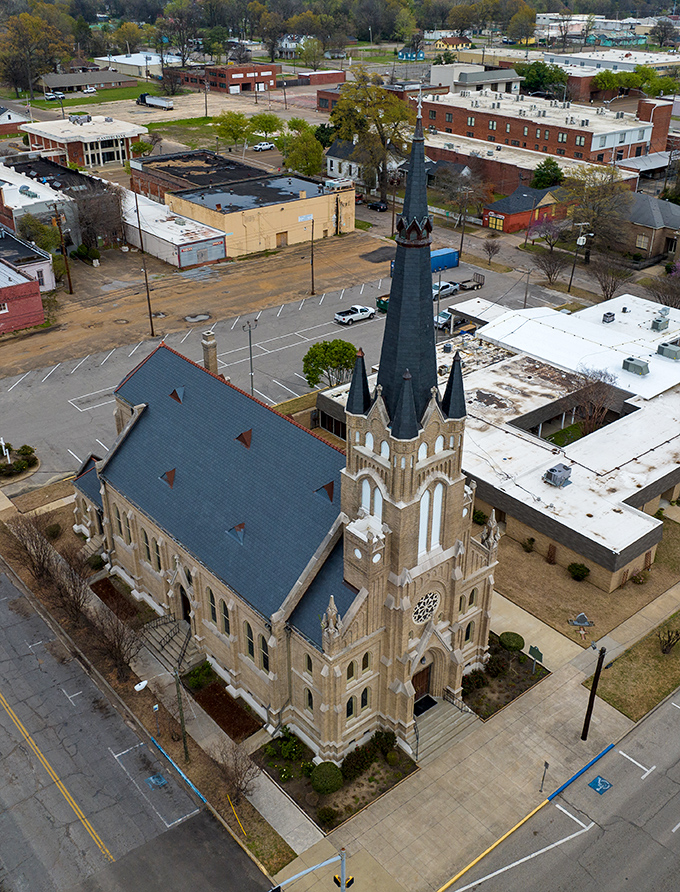 This aerial view of Greenville's historic church showcases the architectural details that early craftsmen created without modern tools – simply magnificent.