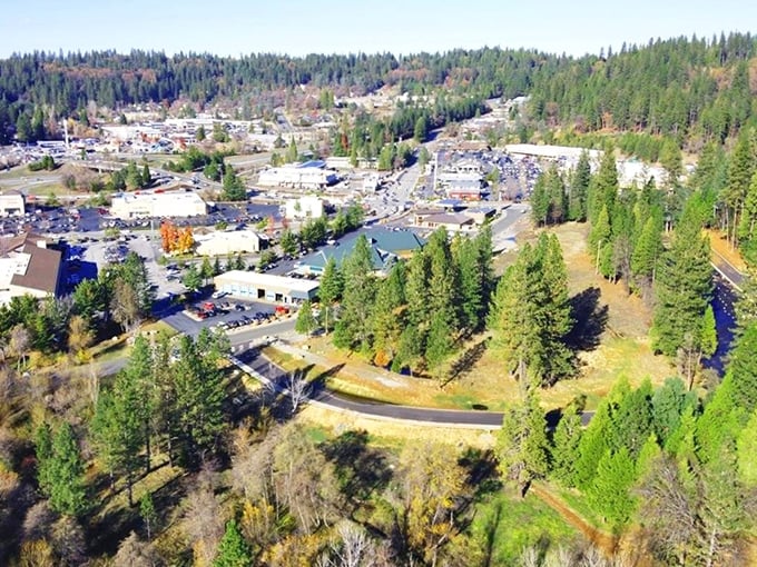 From above, Grass Valley reveals its perfect balance – a town nestled among pines, where civilization and wilderness maintain a friendly handshake agreement.
