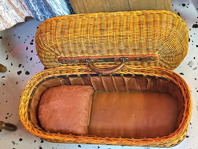 This wicker viewing casket looks surprisingly cozy, like something you might pack a picnic in—if your picnic plans were extraordinarily morbid and final.