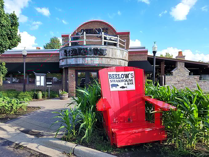 The oversized red chair isn't just for Instagram – it's preparing you for the larger-than-life flavors waiting inside.