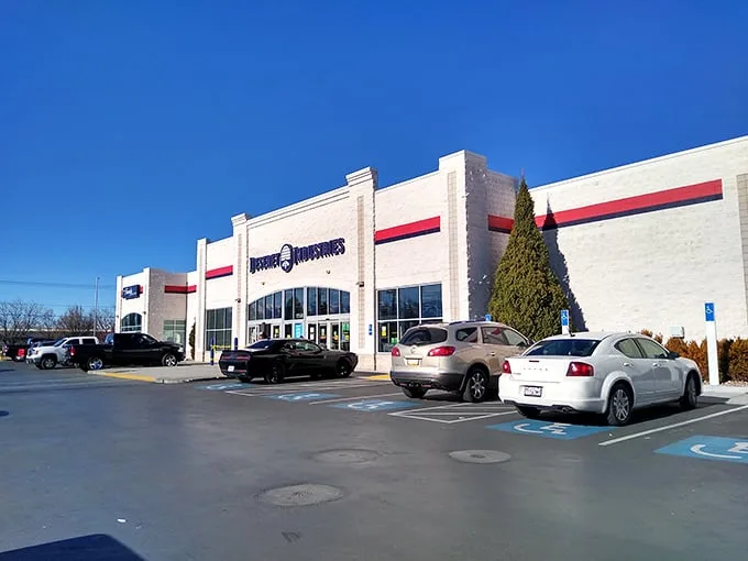 The white fortress of frugality! Deseret Industries' Logan location stands ready for treasure hunters with its signature red stripe.