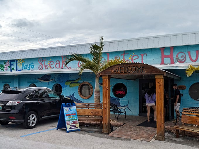 The turquoise beacon of the Florida Keys! This seafood-meets-steak paradise looks like it was designed by Jimmy Buffett after a particularly good margarita.