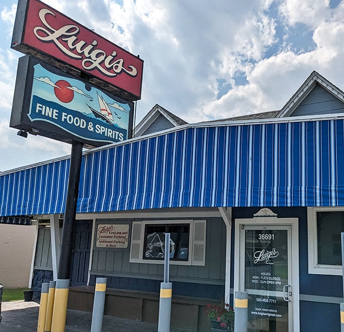 Luigi's iconic blue-awning beckons pizza lovers like a lighthouse guiding hungry sailors to shore.