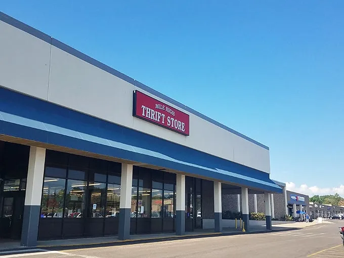 The blue awning of Mile High Thrift Store beckons like a portal to treasure-hunting paradise. Prepare to spend hours exploring inside!