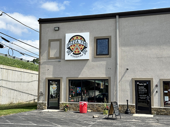 Pizza 750's unassuming exterior hides a wood-fired wonderland where dough transforms into crispy, bubbly perfection.