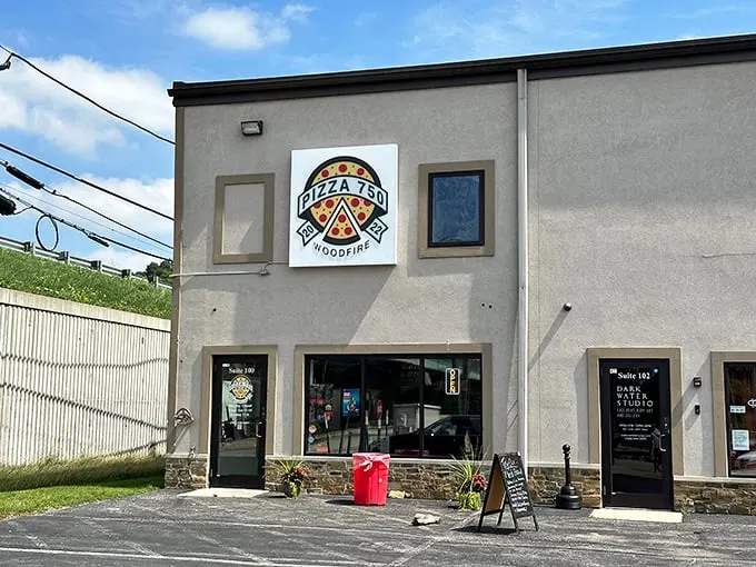 Pizza 750's unassuming exterior hides a wood-fired wonderland where dough transforms into crispy, bubbly perfection.