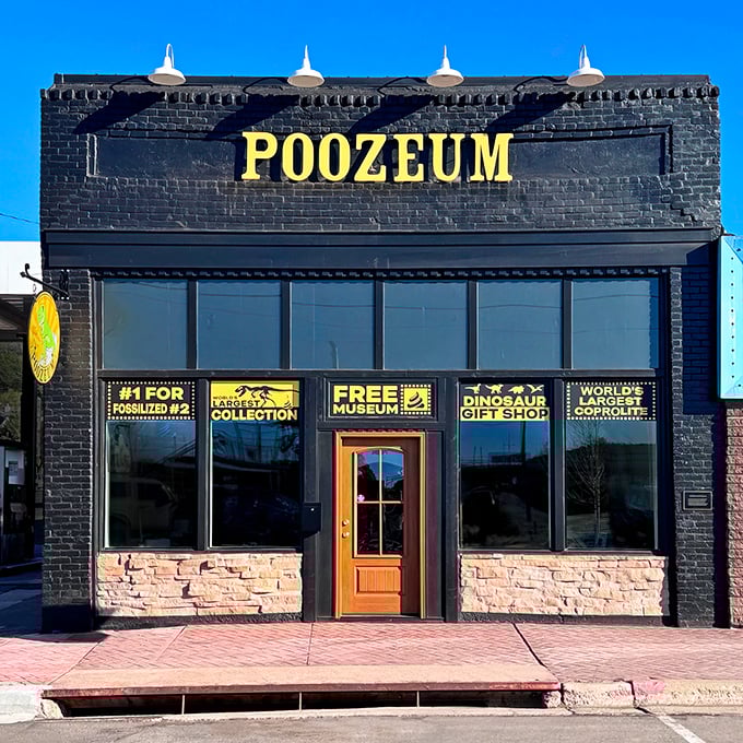 The Poozeum's bold black facade with bright yellow lettering promises a prehistoric adventure into the world's most fascinating fossilized feces.