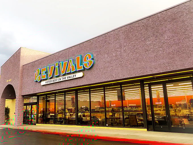 The bold, colorful "Revivals" sign welcomes bargain hunters like a beacon of thrifty hope in Cathedral City.