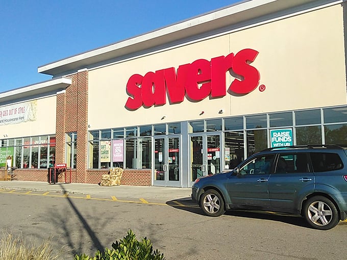 The bright red Savers sign beckons like a lighthouse to thrift enthusiasts. Treasure hunting starts here!