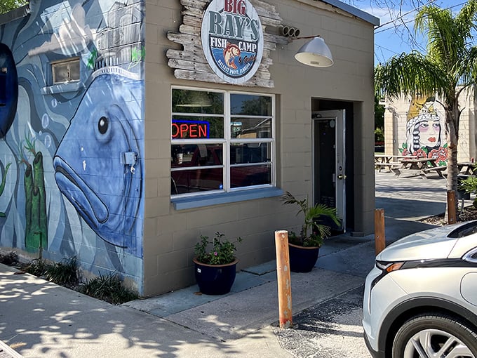 That blue fish mural isn't just decoration – it's a preview of the ocean-fresh delights waiting inside this Tampa treasure.