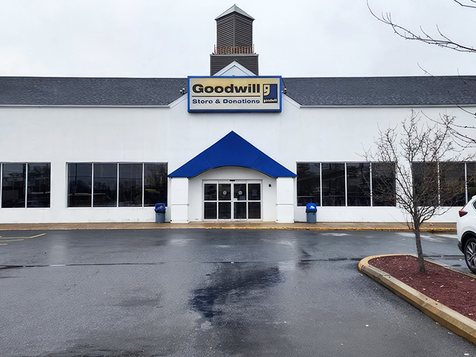 Blue skies, blue awning, and endless possibilities – this Goodwill's exterior barely hints at the wonderland waiting inside.