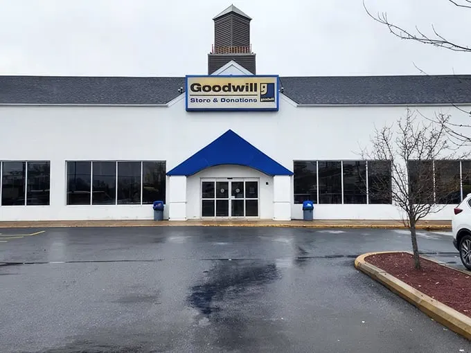 Blue skies, blue awning, and endless possibilities – this Goodwill's exterior barely hints at the wonderland waiting inside.