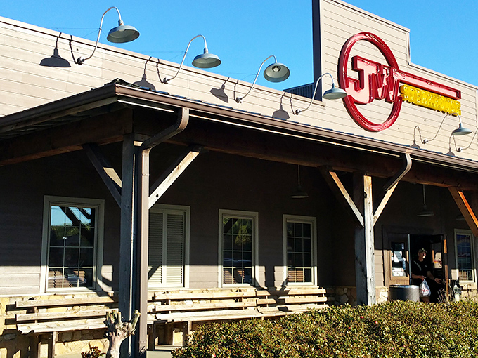 That glowing red sign isn't just decoration – it's a beacon calling all steak lovers home to flavor paradise.