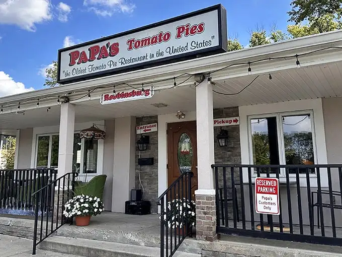 "The Oldest Tomato Pie Restaurant in the United States" isn't just a sign – it's a time machine to pizza perfection.