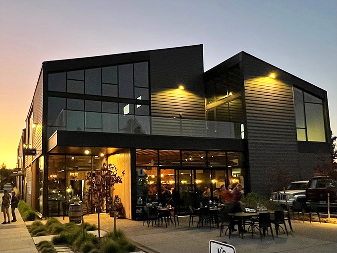 As dusk falls, Rancher Butcher Chef transforms into a glowing beacon for steak lovers seeking refuge from mediocre chain restaurants.