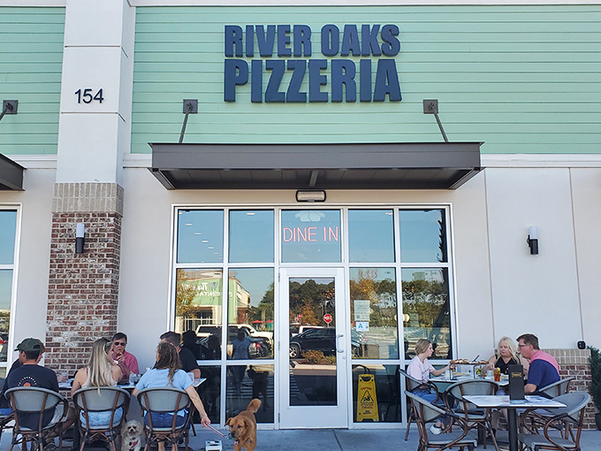 Where pizza dreams come true! River Oaks' welcoming storefront draws in hungry locals and visitors alike for a slice of happiness.