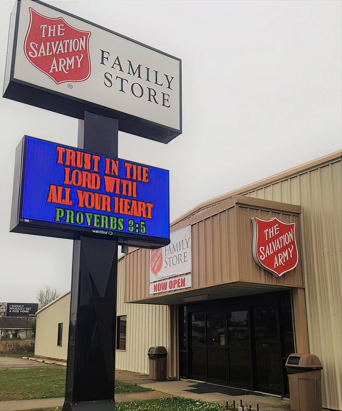 That digital sign isn't just sharing Bible verses—it's signaling to thrift enthusiasts that paradise awaits inside those unassuming doors.