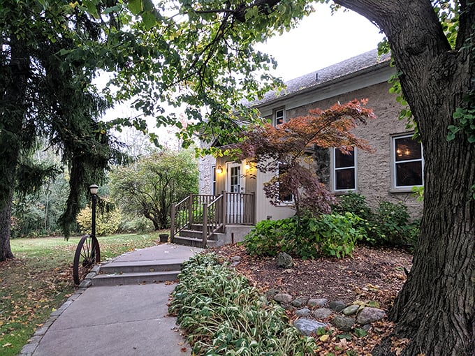 Autumn's embrace frames this historic hideaway where locals whisper about life-changing ribeyes.