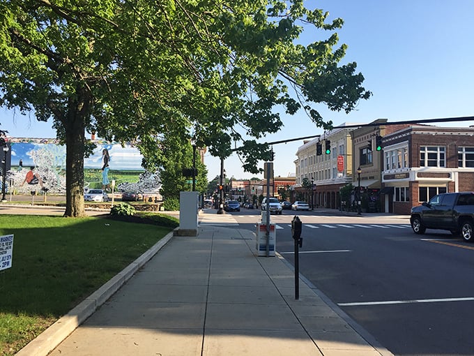 Main Street Torrington unfolds like a Norman Rockwell painting come to life, with leafy trees framing the classic storefronts of this affordable gem.