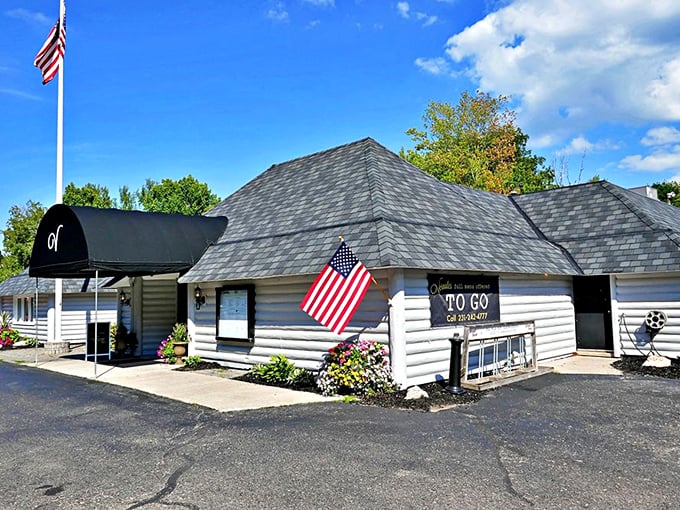 The American flag waves proudly outside Vernales, where patriotism meets perfectly seared ribeyes.