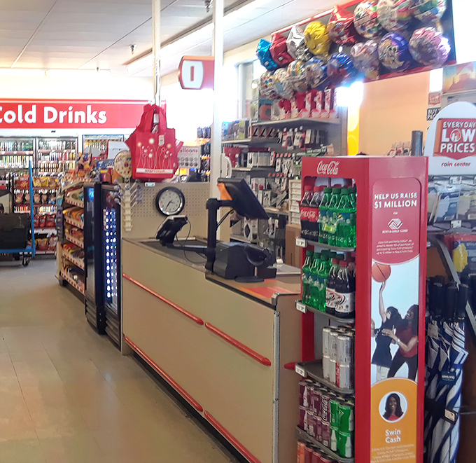 Where retail magic happens! The checkout area offers last-minute treasures and cold drinks for parched deal-seekers.