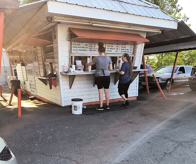 Where culinary magic happens! The no-frills ordering window is where dreams of zippy burgers and perfect fries come true.