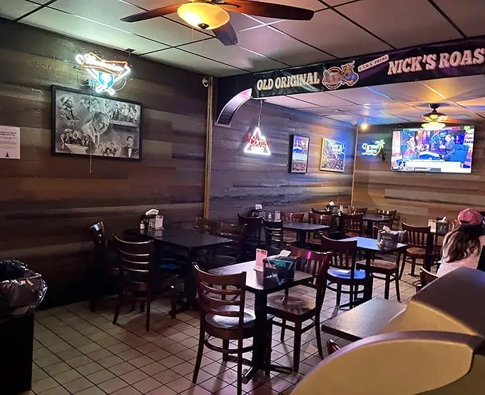 No fancy frills here—just wood paneling, simple tables, and TVs tuned to Philly sports. This is comfort food territory.