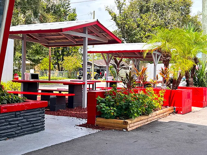 Florida sunshine and sandwich paradise combine at these cheerful outdoor tables. The red and white motif continues, promising casual dining bliss.