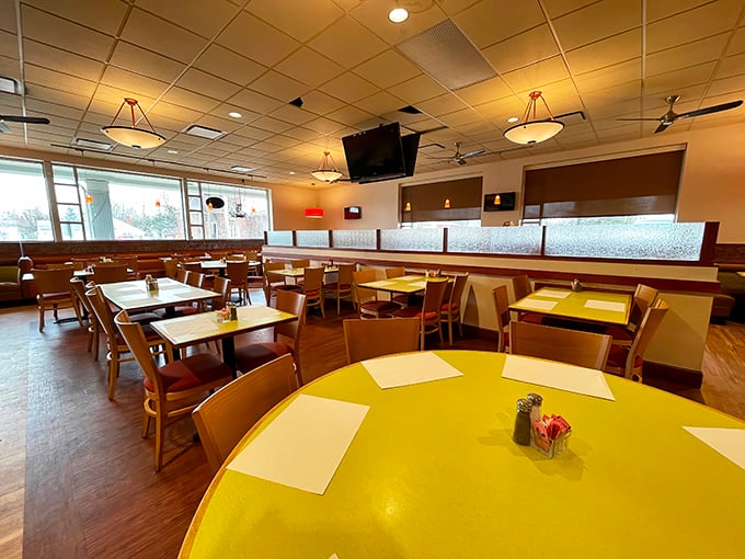 Simple wooden tables and cheerful yellow surfaces create the perfect canvas for culinary masterpieces. No Instagram filters needed—just honest food.