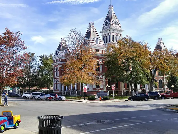 The Livingston County Courthouse isn't just gorgeous architecture—it's the beating heart of Pontiac, where autumn leaves complement its Victorian grandeur perfectly.