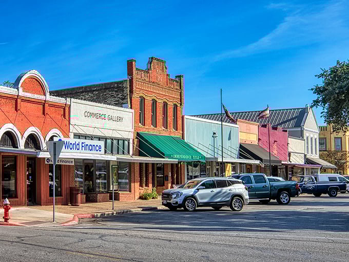 Downtown Lockhart's colorful storefronts create a living museum of Texas architecture, where modern businesses thrive in century-old buildings.