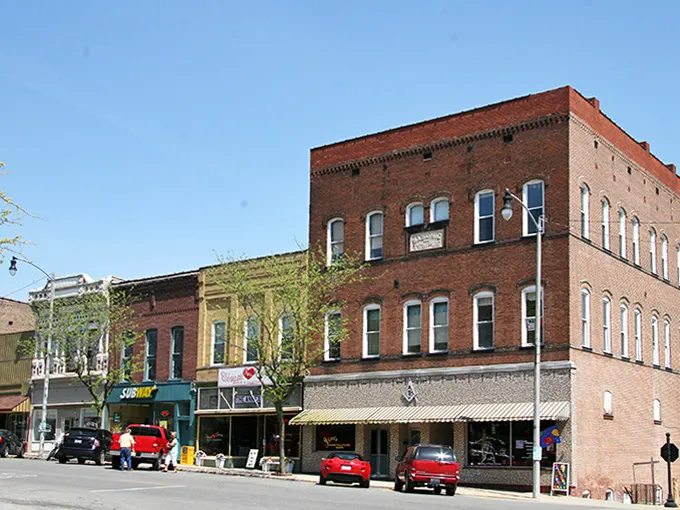 These brick buildings aren't trying to be Instagram-worthy—they're just authentically themselves, which ironically makes them perfect for your social media humble-brag.