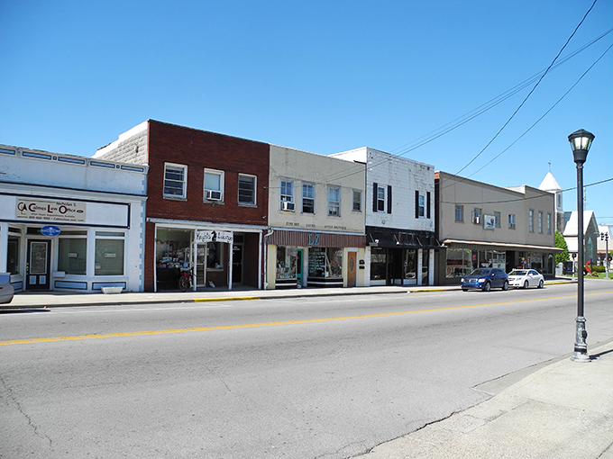 Sun-drenched brick buildings line Berea's main thoroughfare, where vintage architecture and blue skies create the perfect backdrop for unhurried afternoon strolls.