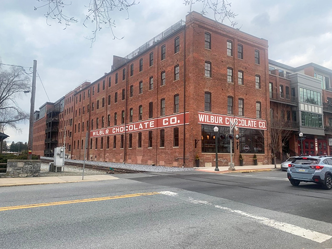 The Wilbur Chocolate factory isn't just a building—it's a brick cathedral to cocoa, standing sentinel over downtown Lititz like a sweet guardian angel.