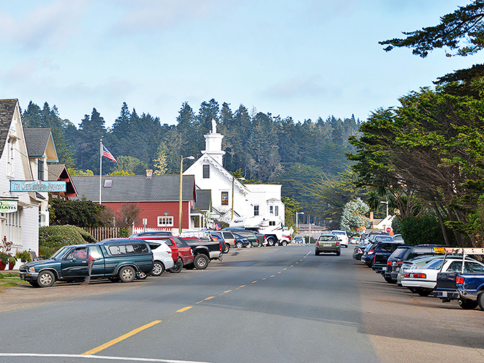 Main Street Mendocino, where New England charm took a wrong turn at Albuquerque and accidentally created California's most picturesque downtown.
