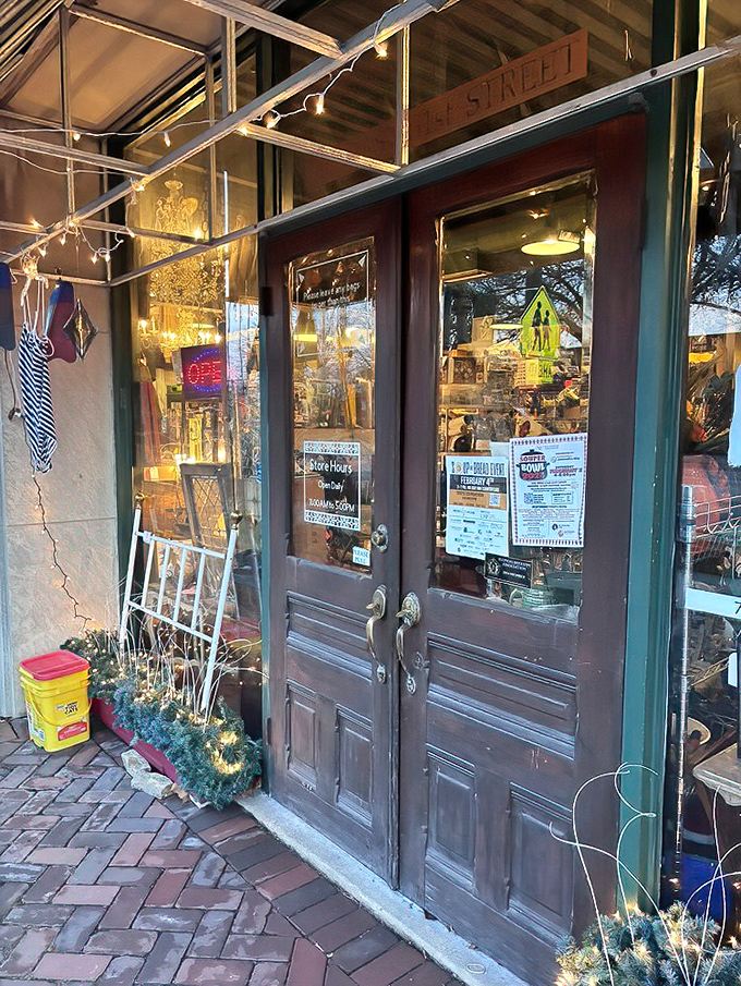 Those vintage wooden doors aren't just an entrance—they're a time portal to decades past, complete with twinkling lights hinting at wonders within.
