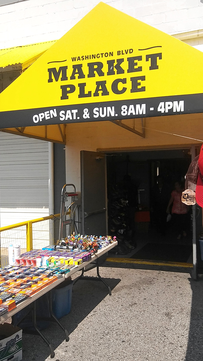 That bright yellow awning serves as a beacon for bargain hunters. Weekend warriors arrive early, empty tote bags in hand, ready for retail adventure.