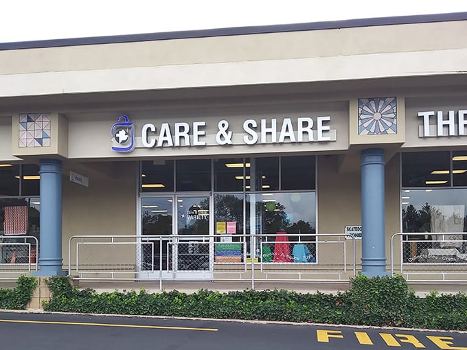 Not your grandmother's thrift store entrance. Care & Share's professional storefront promises an organized treasure hunt rather than a chaotic rummage sale.