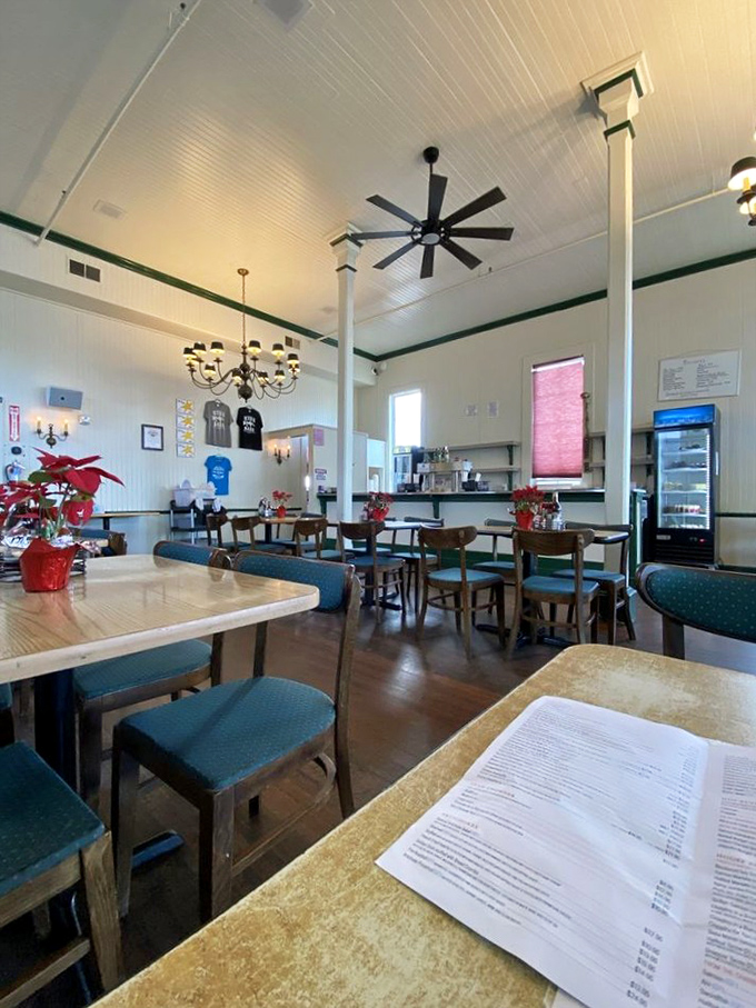 Inside, simplicity reigns supreme with wooden tables, ceiling fans, and poinsettias – proof that great seafood needs no architectural distractions, just room for the flavors to soar.