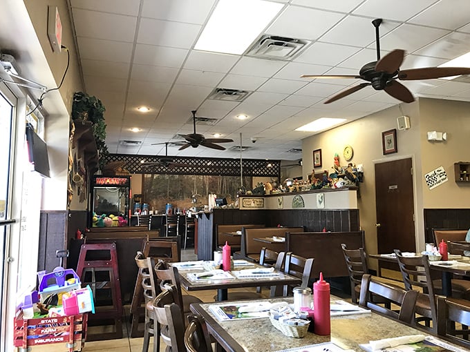 Inside, ceiling fans lazily spin above wooden tables where culinary magic happens daily. This isn't Instagram-bait decor—it's authentic Florida comfort.