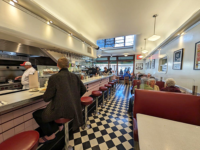 Classic checkered floors and red vinyl booths create the perfect backdrop for life's big decisions: sweet or savory, coffee or mimosa, one pancake or three.